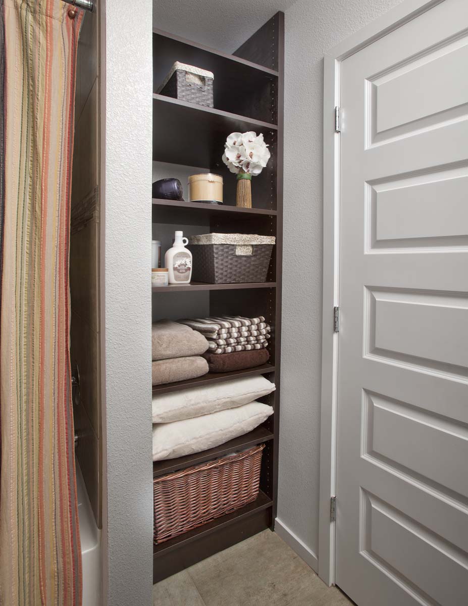 Linen Closet Organization with Arizona Garage & Closet Design